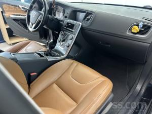 Black Volvo V60 2014 in Riga, with an engine capacity of 2.00 L and mileage of 254 thousand km for 7750 €, photo 22 on AUTOMOTO.COM.LV