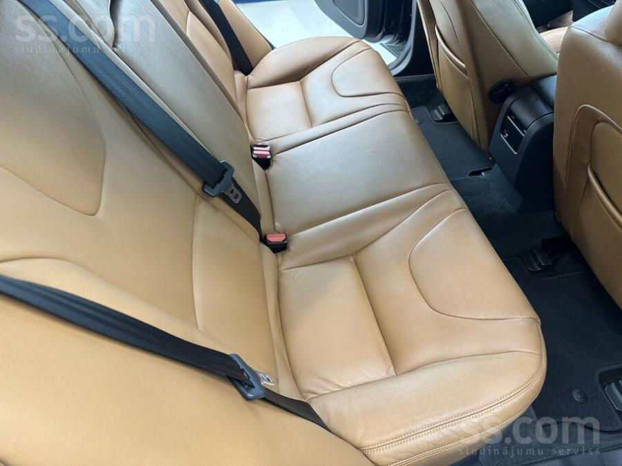 Black Volvo V60 2014 in Riga, with an engine capacity of 2.00 L and mileage of 254 thousand km for 7750 €, photo 23 on AUTOMOTO.COM.LV