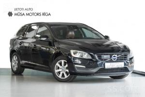 Black Volvo V60 2014 in Riga, with an engine capacity of 2.00 L and mileage of 294 thousand km for 6900 €, photo 8 on AUTOMOTO.COM.LV