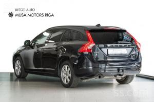 Black Volvo V60 2014 in Riga, with an engine capacity of 2.00 L and mileage of 294 thousand km for 6900 €, photo 9 on AUTOMOTO.COM.LV