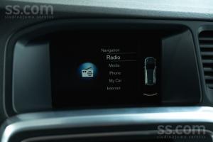 Black Volvo V60 2014 in Riga, with an engine capacity of 2.00 L and mileage of 294 thousand km for 6900 €, photo 18 on AUTOMOTO.COM.LV