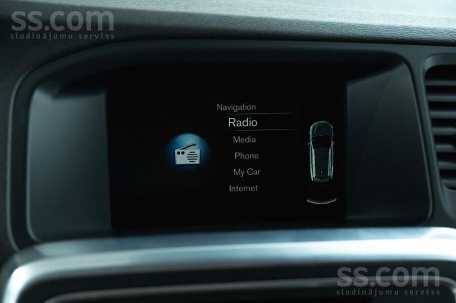 Black Volvo V60 2014 in Riga, with an engine capacity of 2.00 L and mileage of 294 thousand km for 6900 €, photo 18 on AUTOMOTO.COM.LV