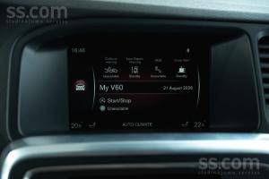 Black Volvo V60 2014 in Riga, with an engine capacity of 2.00 L and mileage of 294 thousand km for 6900 €, photo 20 on AUTOMOTO.COM.LV