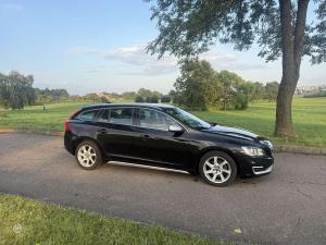 Black Volvo V60 2014 in Kaunas, with an engine capacity of 1.97 L and mileage of 183 thousand km for 7950 €, photo 6 on AUTOMOTO.COM.LV