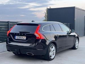 Black Volvo V60 2014 in Vilnius, with an engine capacity of 2.40 L and mileage of 265 thousand km for 6350 €, photo 4 on AUTOMOTO.COM.LV