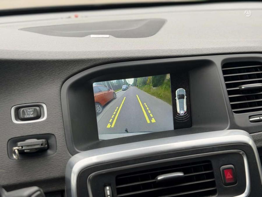 Black Volvo V60 2014 in Vilnius, with an engine capacity of 2.40 L and mileage of 265 thousand km for 6350 €, photo 13 on AUTOMOTO.COM.LV