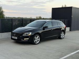 Black Volvo V60 2014 in Vilnius, with an engine capacity of 2.40 L and mileage of 265 thousand km for 6350 €, photo 28 on AUTOMOTO.COM.LV