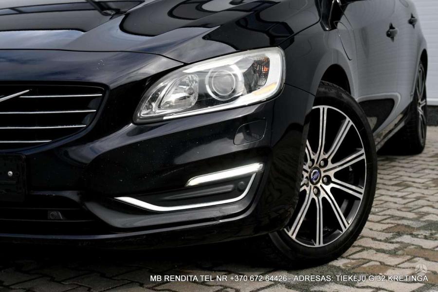 Black Volvo V60 2014 in Kretinga, with an engine capacity of 2.40 L and mileage of 236 thousand km for 8299 €, photo 6 on AUTOMOTO.COM.LV