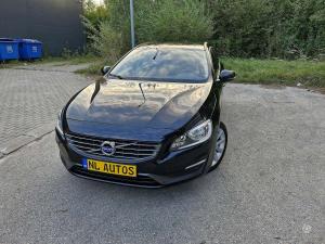 Melns Volvo V60 2014 Alīta, ar dzinēja tilpumu 1.98 L un nobraukumu 260 tūkst. km par 7570 €, foto 26 vietnē AUTOMOTO.COM.LV