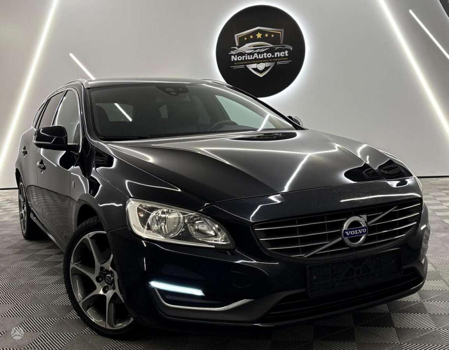 Black Volvo V60 2015 in Marijampole, with an engine capacity of 1.97 L and mileage of 249 thousand km for 7650 €, photo 1 on AUTOMOTO.COM.LV