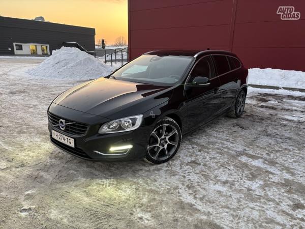 Black Volvo V60 2015 in Kaunas, with an engine capacity of 2.00 L and mileage of 290 thousand km for 7150 €, photo 1 on AUTOMOTO.COM.LV