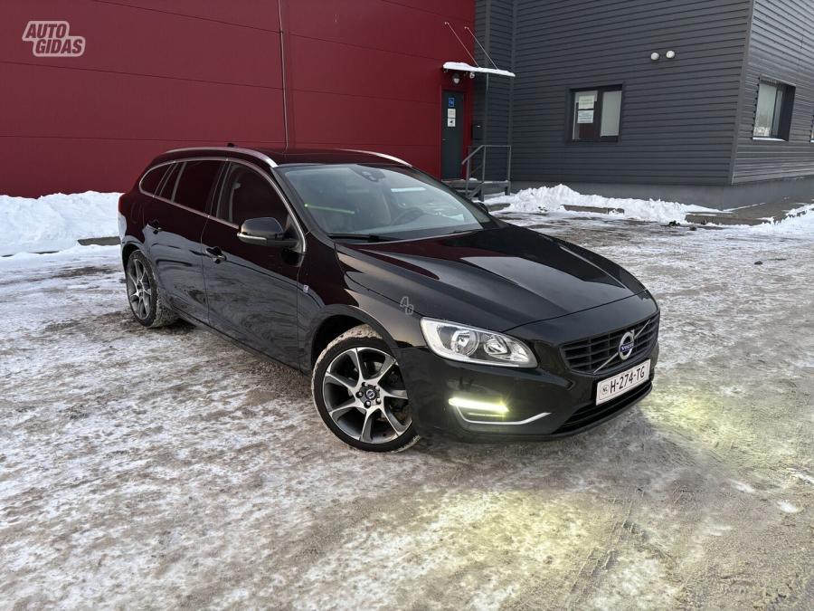 Black Volvo V60 2015 in Kaunas, with an engine capacity of 2.00 L and mileage of 290 thousand km for 7150 €, photo 2 on AUTOMOTO.COM.LV