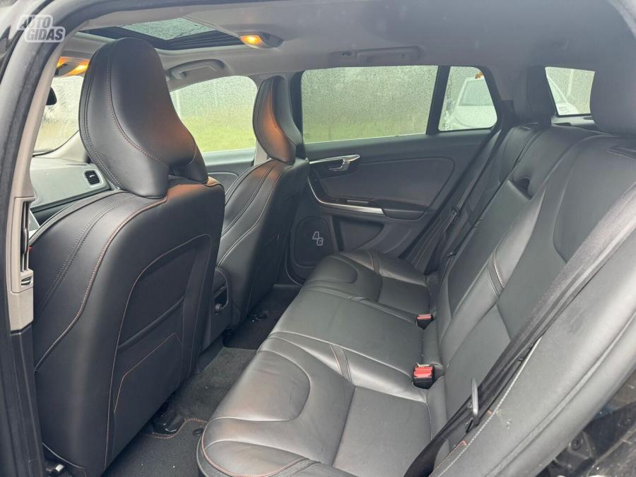Black Volvo V60 2015 in Kaunas, with an engine capacity of 2.00 L and mileage of 290 thousand km for 7150 €, photo 14 on AUTOMOTO.COM.LV