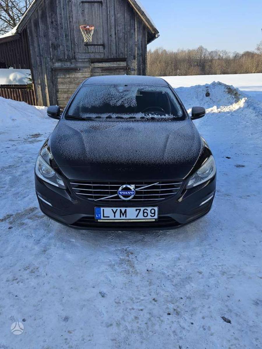 Black Volvo V60 2015 in Klaipeda, with an engine capacity of 2.00 L and mileage of 357 thousand km for 5700 €, photo 1 on AUTOMOTO.COM.LV
