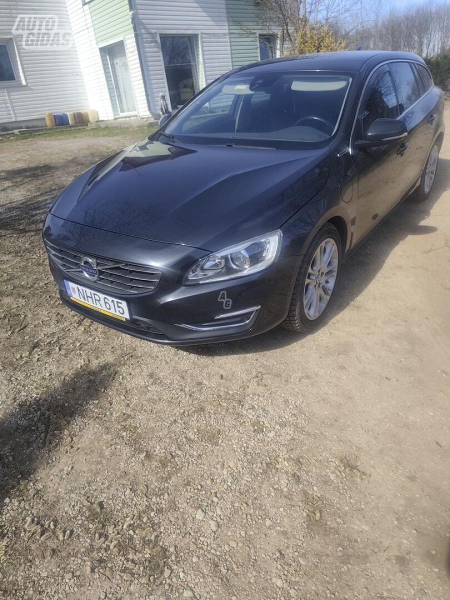 Melns Volvo V60 2015 Viļņa, ar dzinēja tilpumu 2.40 L un nobraukumu 235 tūkst. km par 12000 €, foto 1 vietnē AUTOMOTO.COM.LV