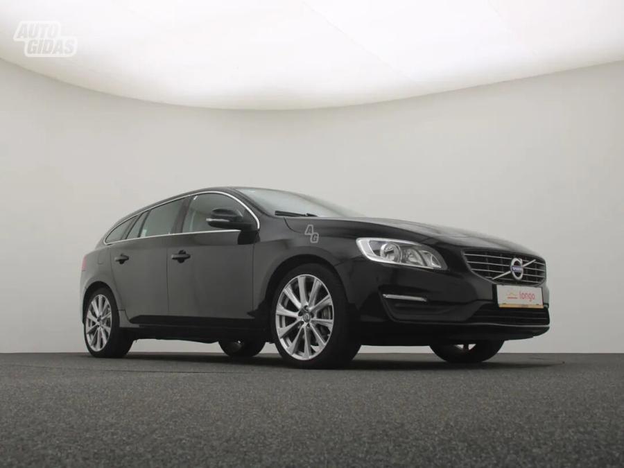 Black Volvo V60 2015 in Vilnius, with an engine capacity of 2.40 L and mileage of 260 thousand km for 9199 €, photo 12 on AUTOMOTO.COM.LV