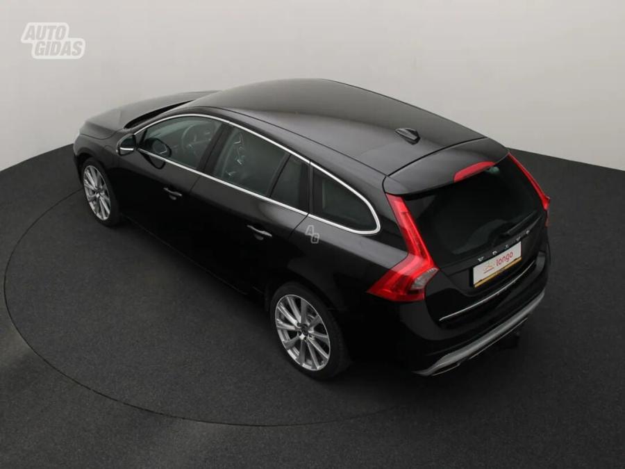 Black Volvo V60 2015 in Vilnius, with an engine capacity of 2.40 L and mileage of 260 thousand km for 9199 €, photo 13 on AUTOMOTO.COM.LV