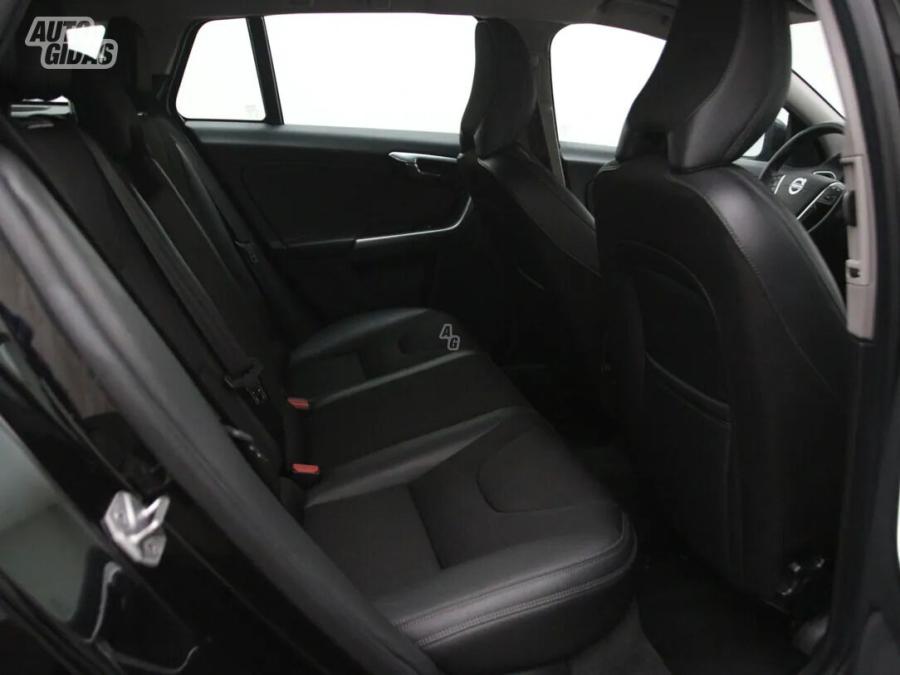 Black Volvo V60 2015 in Vilnius, with an engine capacity of 2.40 L and mileage of 260 thousand km for 9199 €, photo 16 on AUTOMOTO.COM.LV