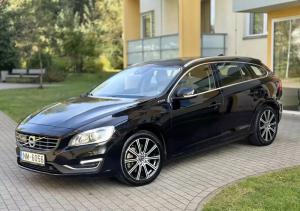 Black Volvo V60 2015 in Riga, with an engine capacity of 2.40 L and mileage of 280 thousand km for 8600 €, photo  on AUTOMOTO.COM.LV