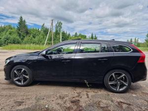Black Volvo V60 2015 in Utena, with an engine capacity of 2.40 L and mileage of 186 thousand km for 8450 €, photo 6 on AUTOMOTO.COM.LV