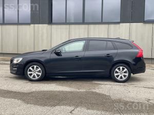 Black Volvo V60 2015 in Riga, with an engine capacity of 2.40 L and mileage of 218 thousand km for 10990 €, photo 8 on AUTOMOTO.COM.LV
