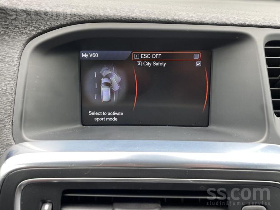 Black Volvo V60 2015 in Riga, with an engine capacity of 2.40 L and mileage of 218 thousand km for 10990 €, photo 26 on AUTOMOTO.COM.LV