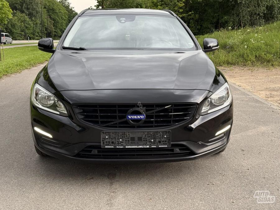 Black Volvo V60 2015 in Alytus, with an engine capacity of 2.00 L and mileage of 244 thousand km for 6666 €, photo 6 on AUTOMOTO.COM.LV