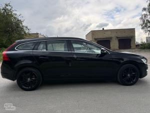 Black Volvo V60 2015 in Alytus, with an engine capacity of 2.00 L and mileage of 244 thousand km for 6666 €, photo 9 on AUTOMOTO.COM.LV