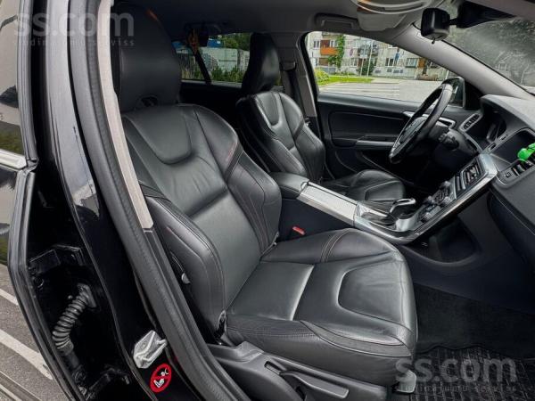 Black Volvo V60 2015 in Riga, with an engine capacity of 2.00 L and mileage of 340 thousand km for 6550 €, photo 10 on AUTOMOTO.COM.LV