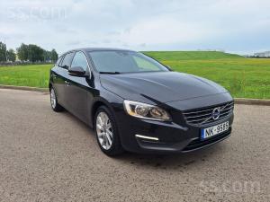 Black Volvo V60 2015 in Riga, with an engine capacity of 1.60 L and mileage of 278 thousand km for 5350 €, photo  on AUTOMOTO.COM.LV
