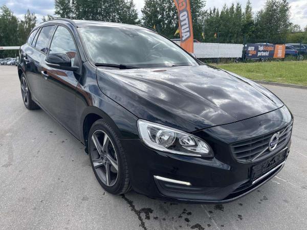 Black Volvo V60 2015 in Kaunas, with an engine capacity of 1.97 L and mileage of 269 thousand km for 6450 €, photo 1 on AUTOMOTO.COM.LV
