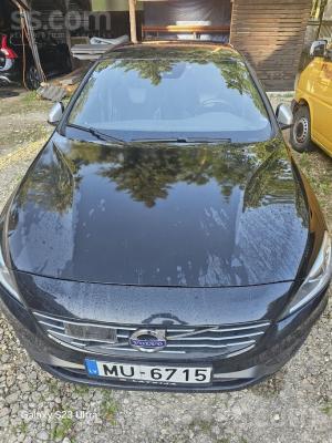 Black Volvo V60 2015 in Riga, with an engine capacity of 2.40 L and mileage of 293 thousand km for 10000 €, photo  on AUTOMOTO.COM.LV