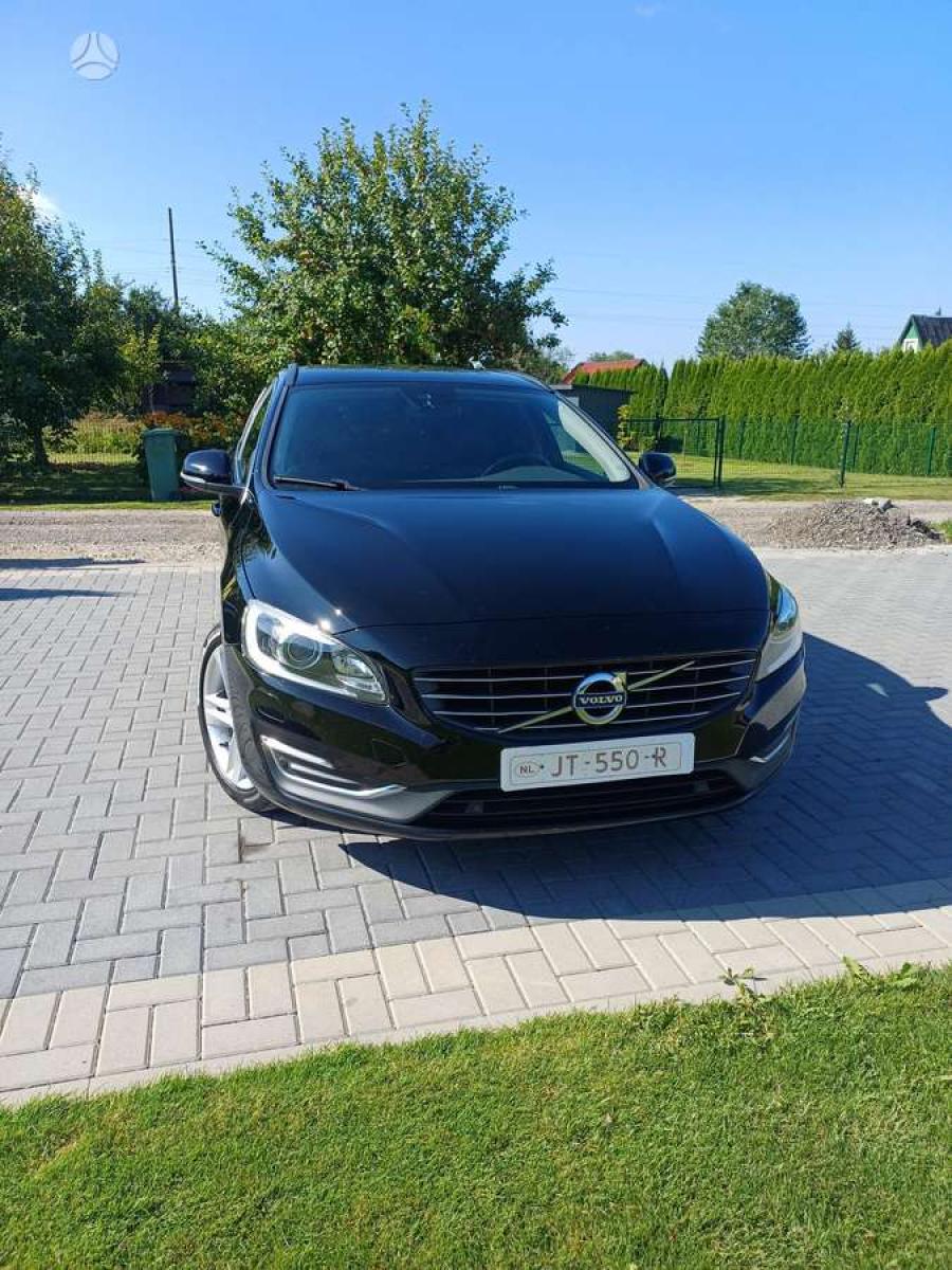 Black Volvo V60 2015 in Raseiniai, with an engine capacity of 2.40 L and mileage of 268 thousand km for 7400 €, photo 1 on AUTOMOTO.COM.LV