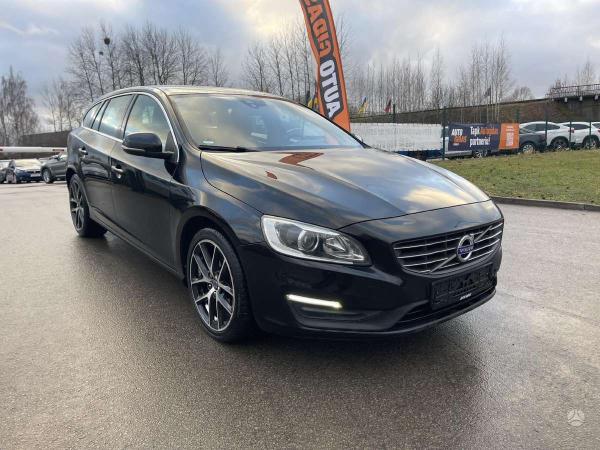 Black Volvo V60 2016 in Kaunas, with an engine capacity of 1.97 L and mileage of 287 thousand km for 6750 €, photo 1 on AUTOMOTO.COM.LV
