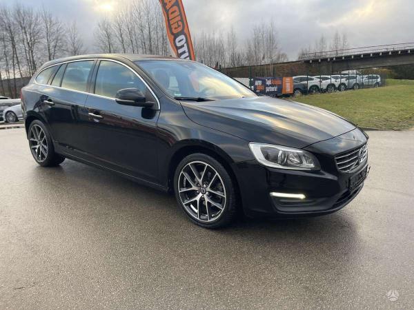 Black Volvo V60 2016 in Kaunas, with an engine capacity of 1.97 L and mileage of 287 thousand km for 6750 €, photo 2 on AUTOMOTO.COM.LV