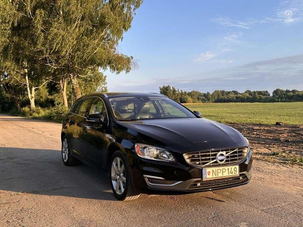 Black Volvo V60 2016 in Klaipeda, with an engine capacity of 1.97 L and mileage of 266 thousand km for 8900 €, photo 1 on AUTOMOTO.COM.LV