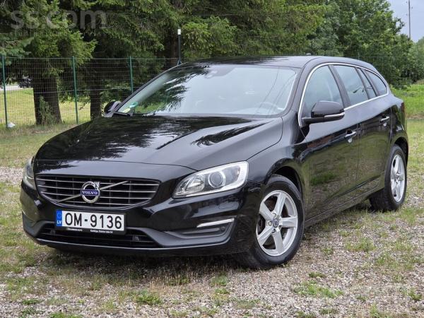 Black Volvo V60 2016 in Kuldiga, with an engine capacity of 2.00 L and mileage of 290 thousand km for 8300 €, photo 1 on AUTOMOTO.COM.LV