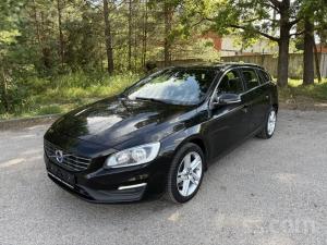 Black Volvo V60 2017 in Ogre, with an engine capacity of 2.40 L and mileage of 255 thousand km for 9199 €, photo  on AUTOMOTO.COM.LV