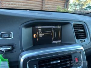 Blue Volvo V60 2013 in Riga, with an engine capacity of 2.40 L and mileage of 275 thousand km for 8350 €, photo 25 on AUTOMOTO.COM.LV