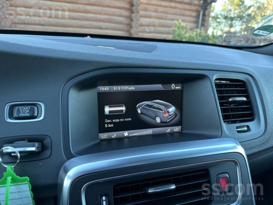 Blue Volvo V60 2013 in Riga, with an engine capacity of 2.40 L and mileage of 275 thousand km for 8350 €, photo 27 on AUTOMOTO.COM.LV