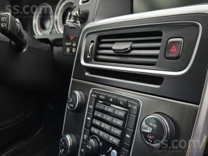 Blue Volvo V60 2012 in Jekabpils, with an engine capacity of 2.00 L and mileage of 300 thousand km for 6590 €, photo 21 on AUTOMOTO.COM.LV