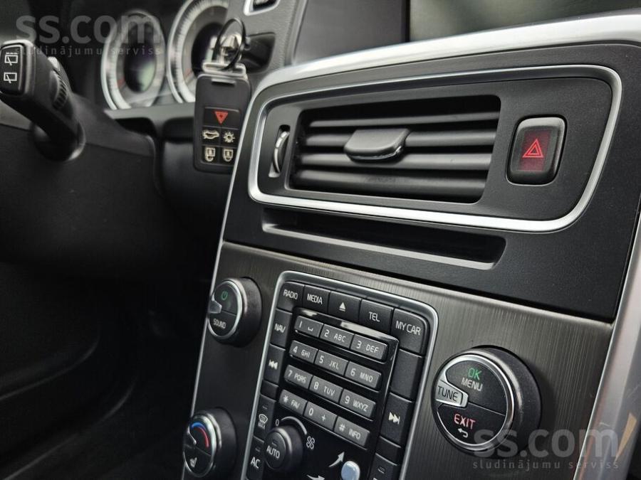 Blue Volvo V60 2012 in Jekabpils, with an engine capacity of 2.00 L and mileage of 300 thousand km for 6590 €, photo 21 on AUTOMOTO.COM.LV