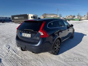 Blue Volvo V60 2013 in Tallinn, with an engine capacity of 2.40 L and mileage of 286 thousand km for 6999 €, photo 7 on AUTOMOTO.COM.LV