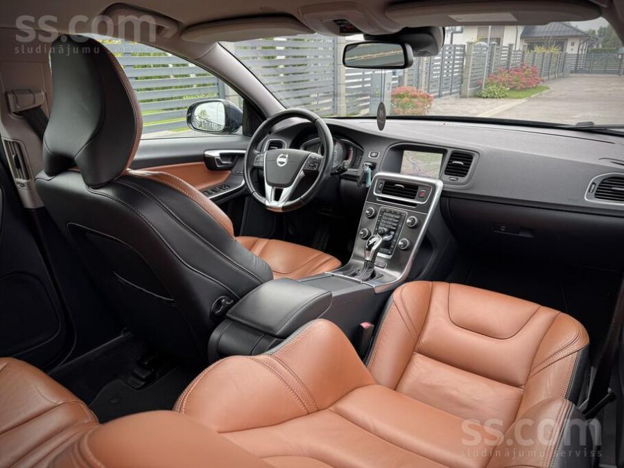 Zils Volvo V60 2013 Jelgava, ar dzinēja tilpumu 2.40 L un nobraukumu 263 tūkst. km par 8500 €, foto 14 vietnē AUTOMOTO.COM.LV