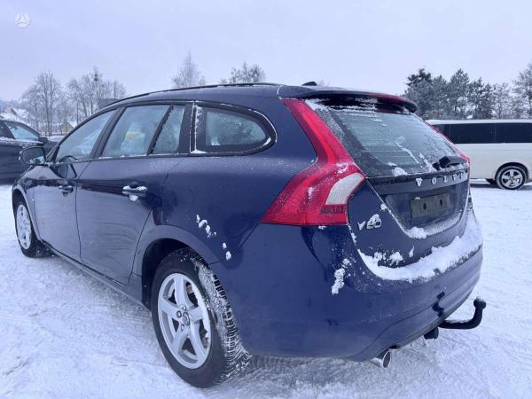Blue Volvo V60 2014 in Alytus, with an engine capacity of 1.56 L and mileage of 261 thousand km for 6500 €, photo 10 on AUTOMOTO.COM.LV