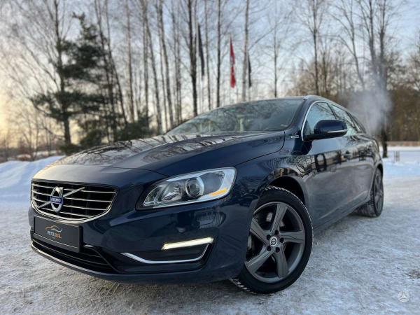 Blue Volvo V60 2014 in Kazlu Ruda, with an engine capacity of 2.40 L and mileage of 250 thousand km for 6999 €, photo 6 on AUTOMOTO.COM.LV