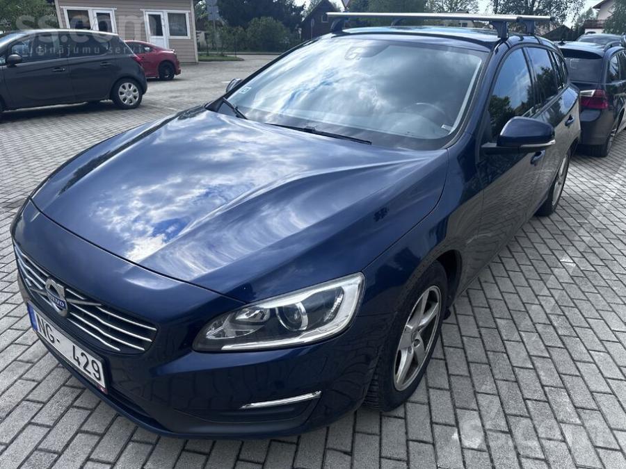 Blue Volvo V60 2014 in Riga, with an engine capacity of 2.00 L and mileage of 263 thousand km for 8900 €, photo 3 on AUTOMOTO.COM.LV