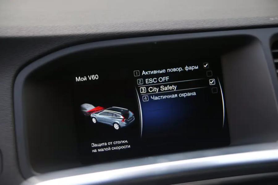 Blue Volvo V60 2014 in Riga, with an engine capacity of 2.40 L and mileage of 295 thousand km for 6490 €, photo 21 on AUTOMOTO.COM.LV