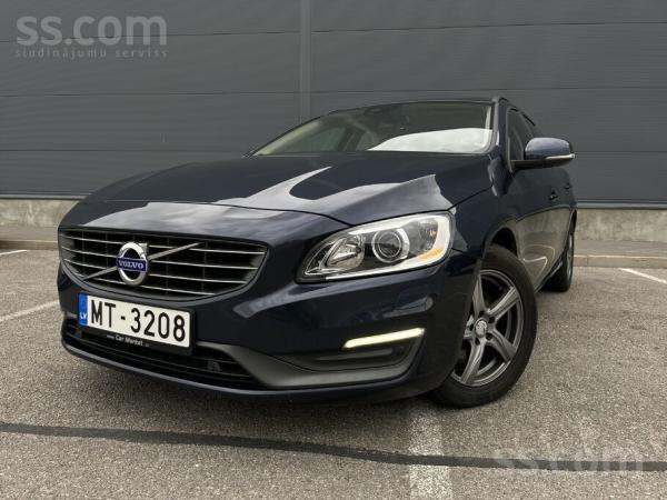 Blue Volvo V60 2014 in Riga, with an engine capacity of 2.00 L and mileage of 214 thousand km for 6990 €, photo 1 on AUTOMOTO.COM.LV