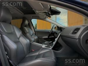 Blue Volvo V60 2014 in Riga, with an engine capacity of 2.00 L and mileage of 274 thousand km for 8150 €, photo 14 on AUTOMOTO.COM.LV